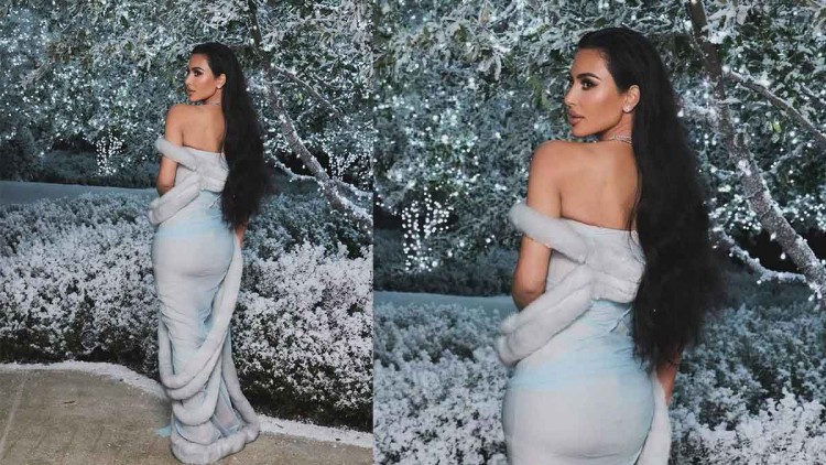 Kim Kardashian Flaunts her Curves in Icy Blue Silk Dress