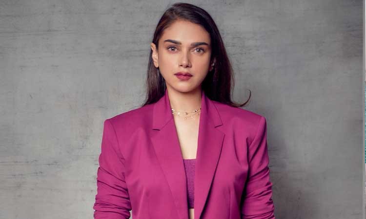 Aditi Rao Hydari delivers boss lady vibes in a magenta pantsuit