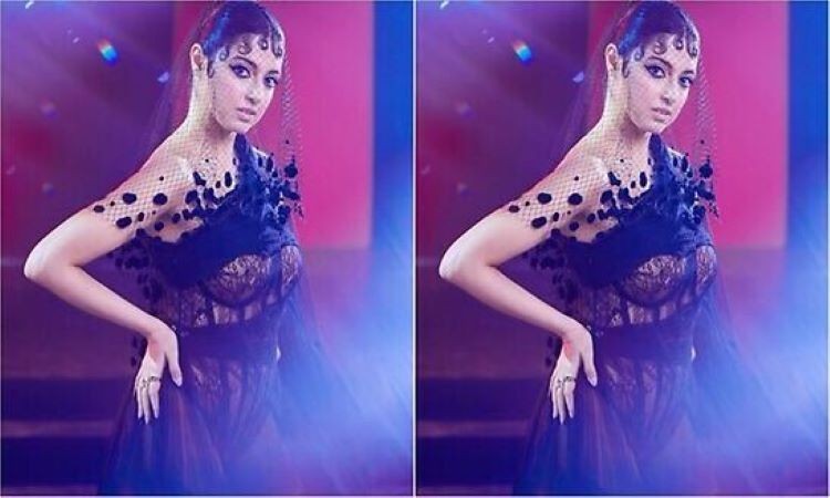 Divya Khosla Kumar in sheer black dress with net detailing channelizes her inner diva