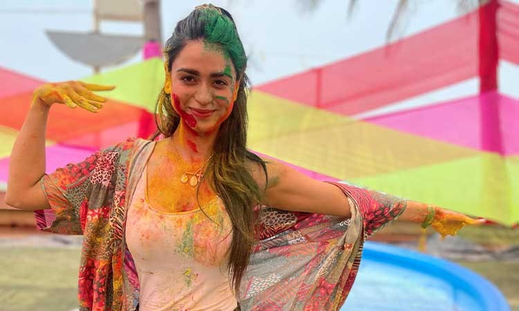 Soundarya Sharma flaunts her hourglass figure in white dress