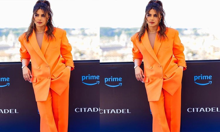 Boss lady alert! Priyanka Chopra rocks an orange pantsuit