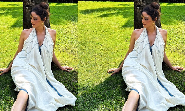 Tabu's gorgeous white wrap dress steals the show