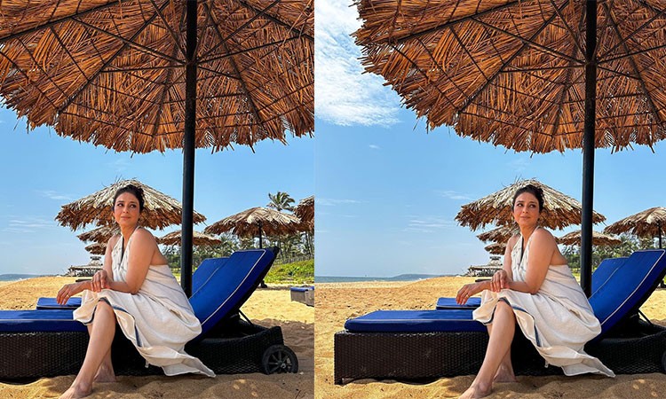 Tabu's gorgeous white wrap dress steals the show