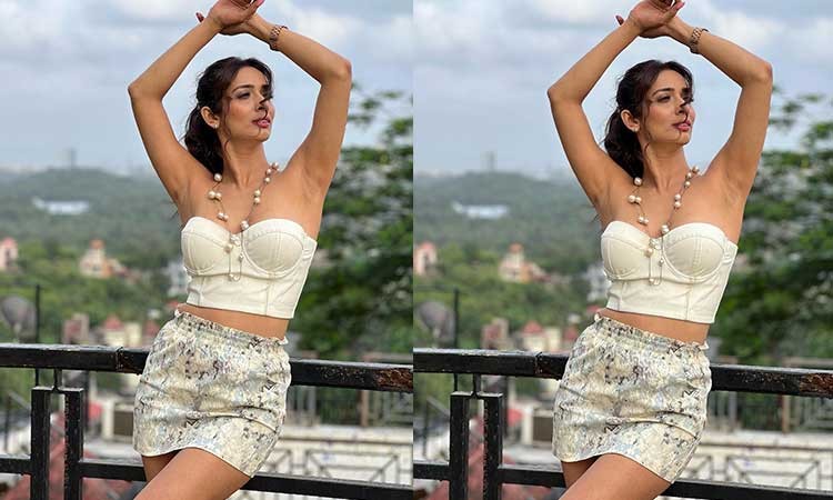 Malaika Arora's Doppelganger Heena Panchal oozes oomph in white tube top and printed skirt