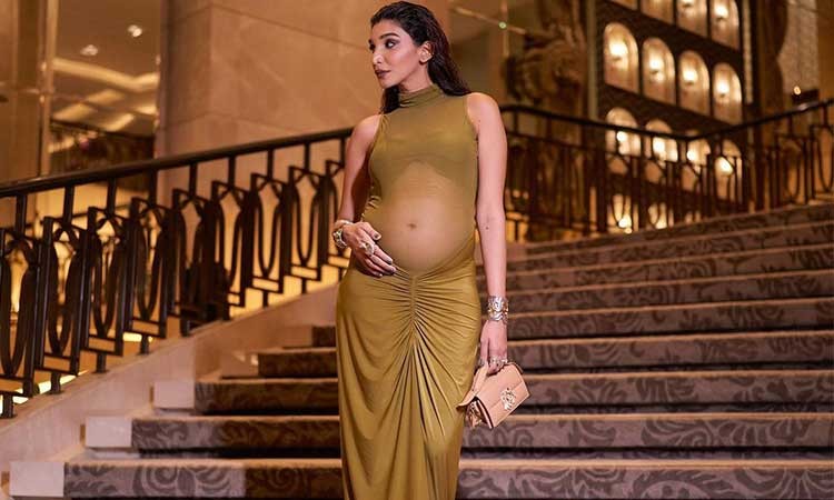 Maternity Chic: Juhi Godambe flaunts baby bump in olive see-through gown