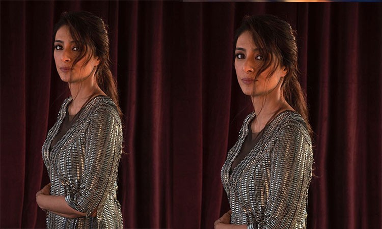 Tabu's gorgeous white wrap dress steals the show